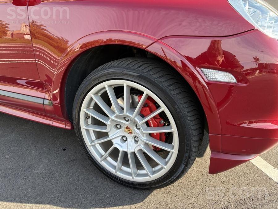 Red Porsche Cayenne 2008 in Riga, with an engine capacity of 4.80 L and mileage of 245 thousand km for 19900 €, photo 6 on AUTOMOTO.COM.LV