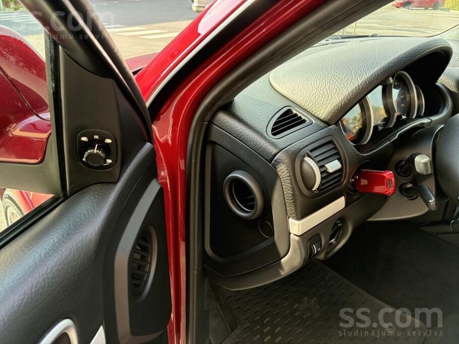 Red Porsche Cayenne 2008 in Riga, with an engine capacity of 4.80 L and mileage of 245 thousand km for 19900 €, photo 13 on AUTOMOTO.COM.LV