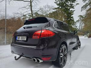 Violets Porsche Cayenne 2010 Rīga, ar dzinēja tilpumu 4.80 L un nobraukumu 309 tūkst. km par 16500 €, foto 15 vietnē AUTOMOTO.COM.LV
