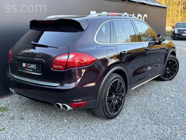 Violet Porsche Cayenne 2011 in Riga, with an engine capacity of 4.80 L and mileage of 289 thousand km for 14990 €, photo 4 on AUTOMOTO.COM.LV