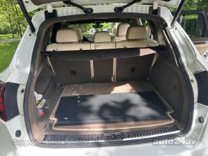 White Porsche Cayenne 2012 in Tartu, with an engine capacity of 4.80 L and mileage of 208 thousand km for 20500 €, photo 15 on AUTOMOTO.COM.LV