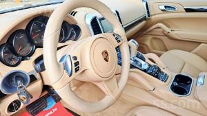 White Porsche Cayenne 2014 in Riga, with an engine capacity of 3.00 L and mileage of 208 thousand km for 19500 €, photo 20 on AUTOMOTO.COM.LV