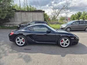 Melns Porsche Cayman 2007 Rīga, ar dzinēja tilpumu 3.40 L un nobraukumu 157 tūkst. km par 19990 €, foto 6 vietnē AUTOMOTO.COM.LV