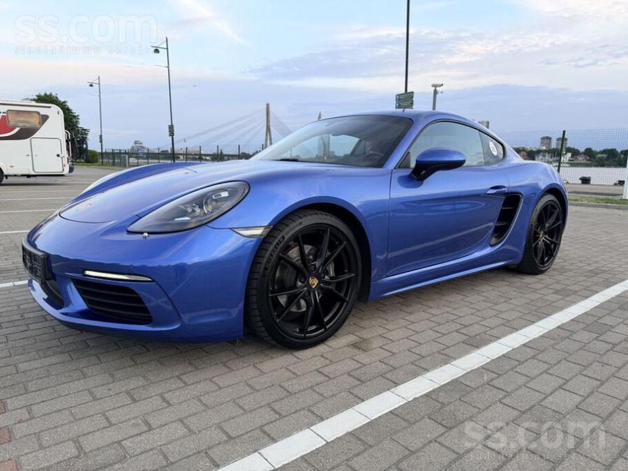 Blue Porsche Cayman 2019 in Riga, with an engine capacity of 2.00 L and mileage of 77 thousand km for 51900 €, photo 1 on AUTOMOTO.COM.LV