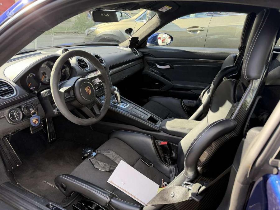 Blue Porsche Cayman 2022 in Vilnius, with an engine capacity of 4.00 L and mileage of 21 thousand km for 118999 €, photo 6 on AUTOMOTO.COM.LV