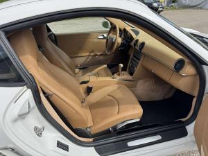 White Porsche Cayman 2008 in Panevezys, with an engine capacity of 3.39 L and mileage of 149 thousand km for 19900 €, photo 6 on AUTOMOTO.COM.LV