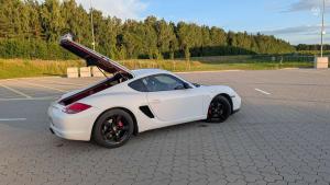 White Porsche Cayman 2010 in Vilnius, with an engine capacity of 3.44 L and mileage of 141 thousand km for 37900 €, photo 9 on AUTOMOTO.COM.LV