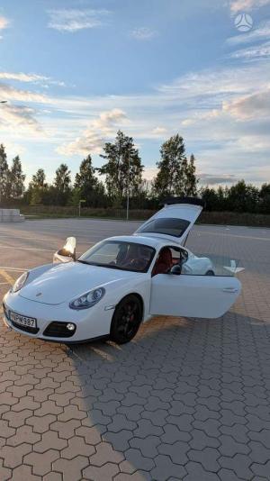 White Porsche Cayman 2010 in Vilnius, with an engine capacity of 3.44 L and mileage of 141 thousand km for 37900 €, photo 21 on AUTOMOTO.COM.LV