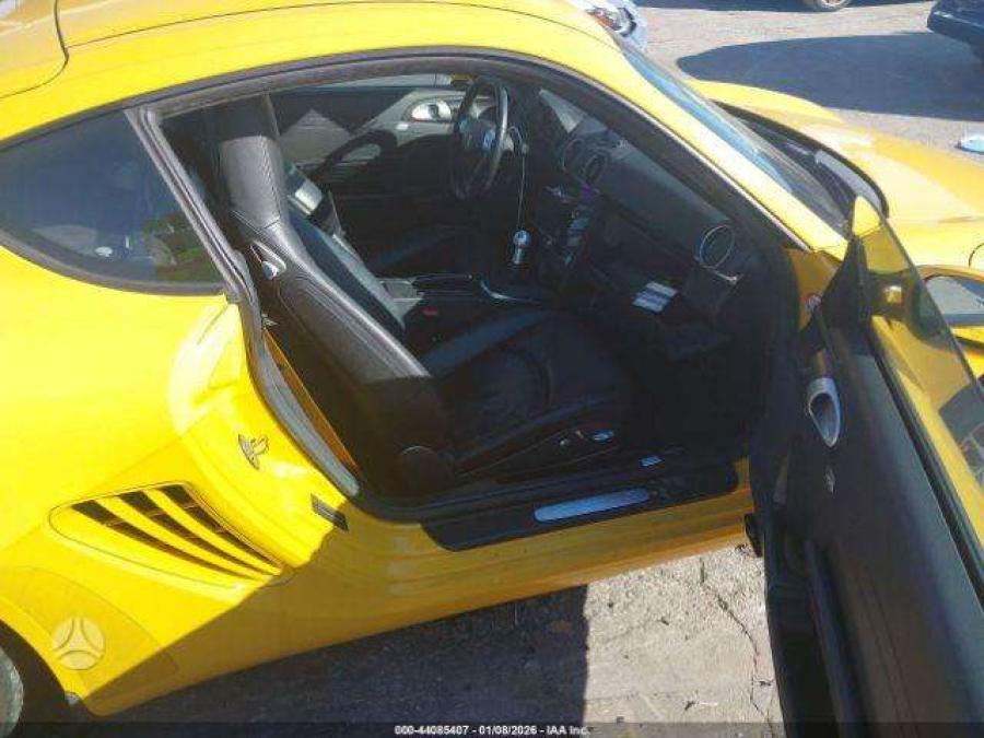 Yellow Porsche Cayman 2006 in Klaipeda, with an engine capacity of 3.39 L and mileage of 143 thousand km for 9600 €, photo 5 on AUTOMOTO.COM.LV