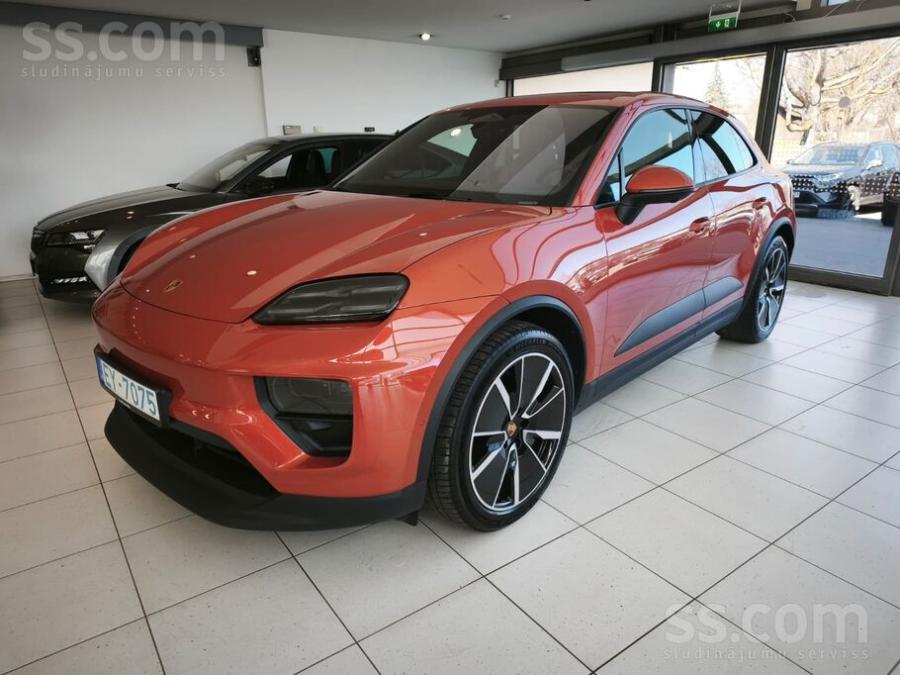 Orange Porsche Macan 2025 in Riga, with an engine capacity of 0.00 L and mileage of 20 thousand km for 80900 €, photo 1 on AUTOMOTO.COM.LV
