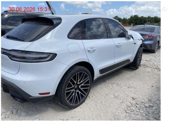 White Porsche Macan 2024 in Klaipeda, with an engine capacity of 1.98 L and mileage of 65 thousand km for 27200 €, photo 7 on AUTOMOTO.COM.LV