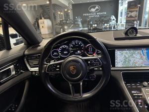 Black Porsche Panamera 2017 in Riga, with an engine capacity of 3.00 L and mileage of 76 thousand km for 51900 €, photo 18 on AUTOMOTO.COM.LV