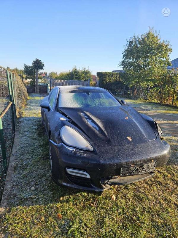 Black Porsche Panamera 2010 in Kaunas, with an engine capacity of 4.81 L and mileage of 303 thousand km for 7900 €, photo 4 on AUTOMOTO.COM.LV