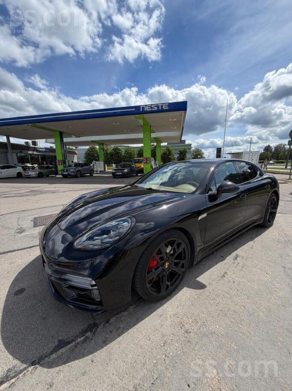 Melns Porsche Panamera 2012 Rīga, ar dzinēja tilpumu 3.60 L un nobraukumu 140 tūkst. km par 29500 €, foto 1 vietnē AUTOMOTO.COM.LV