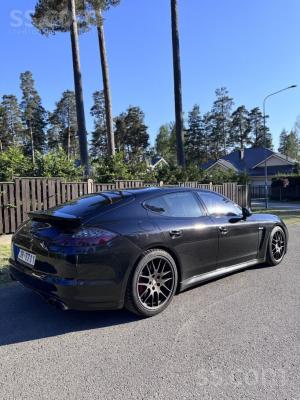 Black Porsche Panamera 2010 in Riga, with an engine capacity of 4.80 L and mileage of 206 thousand km for 23750 €, photo 1 on AUTOMOTO.COM.LV