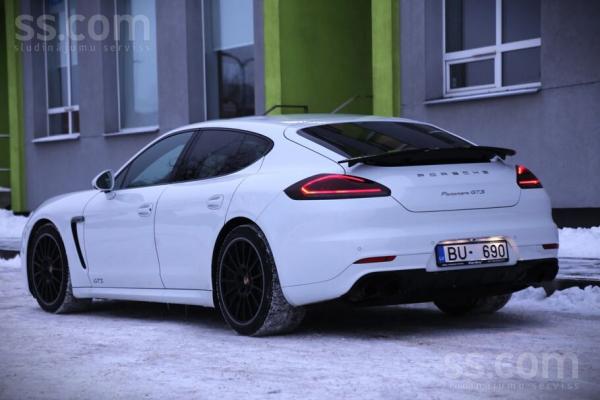White Porsche Panamera 2014 in Riga, with an engine capacity of 4.80 L and mileage of 126 thousand km for 37995 €, photo 2 on AUTOMOTO.COM.LV
