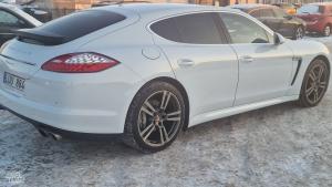 White Porsche Panamera 2013 in Kretinga, with an engine capacity of 4.80 L and mileage of 162 thousand km for 20999 €, photo 5 on AUTOMOTO.COM.LV
