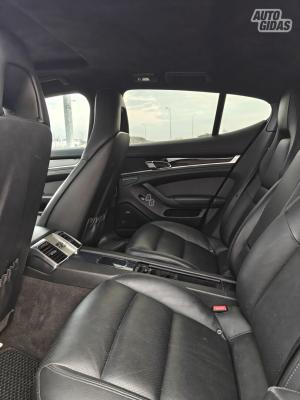 White Porsche Panamera 2015 in Vilnius, with an engine capacity of 3.60 L and mileage of 192 thousand km for 15700 €, photo 6 on AUTOMOTO.COM.LV