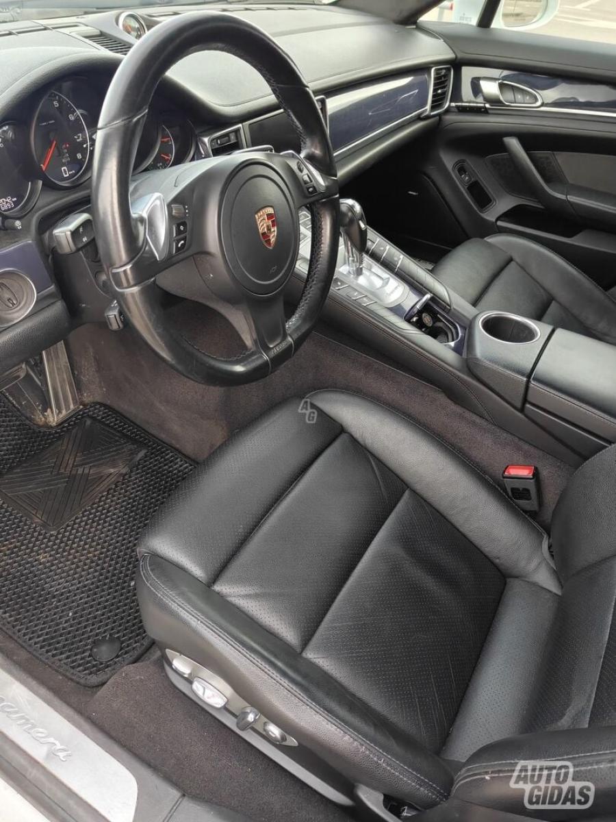 White Porsche Panamera 2015 in Vilnius, with an engine capacity of 3.60 L and mileage of 192 thousand km for 15700 €, photo 7 on AUTOMOTO.COM.LV