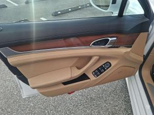 White Porsche Panamera 2016 in Klaipeda, with an engine capacity of 3.61 L and mileage of 154 thousand km for 23700 €, photo 22 on AUTOMOTO.COM.LV