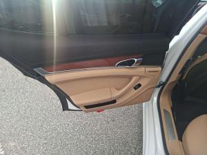 White Porsche Panamera 2016 in Klaipeda, with an engine capacity of 3.61 L and mileage of 154 thousand km for 23700 €, photo 23 on AUTOMOTO.COM.LV