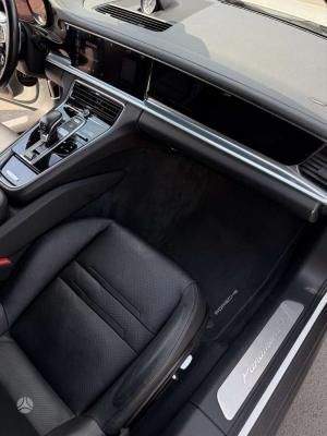 White Porsche Panamera 2018 in Kaunas, with an engine capacity of 2.89 L and mileage of 95 thousand km for 41000 €, photo 21 on AUTOMOTO.COM.LV