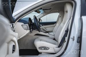 White Porsche Panamera 2011 in Riga, with an engine capacity of 4.80 L and mileage of 218 thousand km for 13950 €, photo 11 on AUTOMOTO.COM.LV