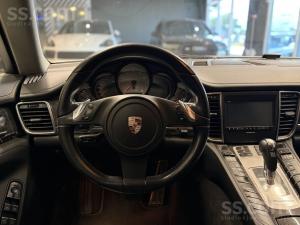 White Porsche Panamera 2012 in Riga, with an engine capacity of 4.80 L and mileage of 124 thousand km for 22690 €, photo 16 on AUTOMOTO.COM.LV