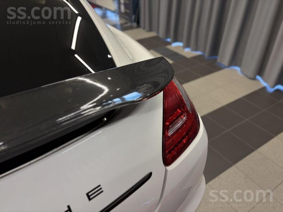 White Porsche Panamera 2012 in Riga, with an engine capacity of 4.80 L and mileage of 124 thousand km for 22690 €, photo 24 on AUTOMOTO.COM.LV