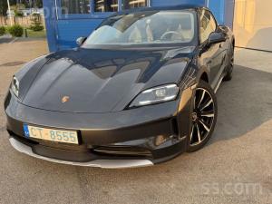 Black Porsche Taycan 2024 in Riga, with an engine capacity of 0.00 L and mileage of 63 thousand km for 70500 €, photo  on AUTOMOTO.COM.LV