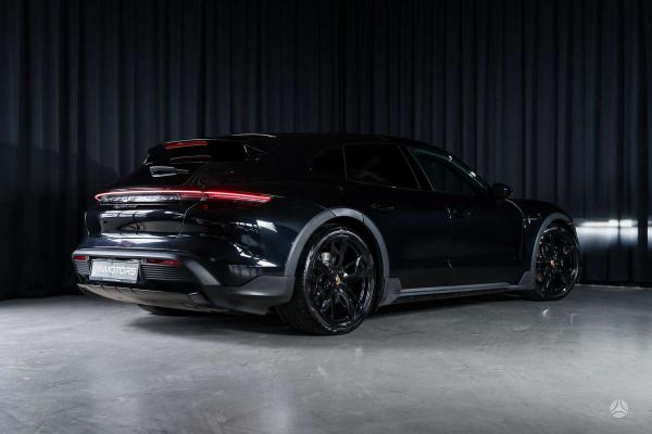 Black Porsche Taycan 2021 in Vilnius, with an engine capacity of 0.00 L and mileage of 84 thousand km for 64999 €, photo 4 on AUTOMOTO.COM.LV