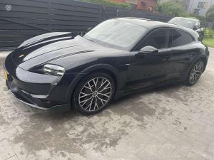 Black Porsche Taycan 2022 in Kaunas, with an engine capacity of 0.00 L and mileage of 66 thousand km for 56500 €, photo 4 on AUTOMOTO.COM.LV