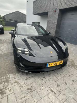 Black Porsche Taycan 2022 in Kaunas, with an engine capacity of 0.00 L and mileage of 66 thousand km for 56500 €, photo 6 on AUTOMOTO.COM.LV