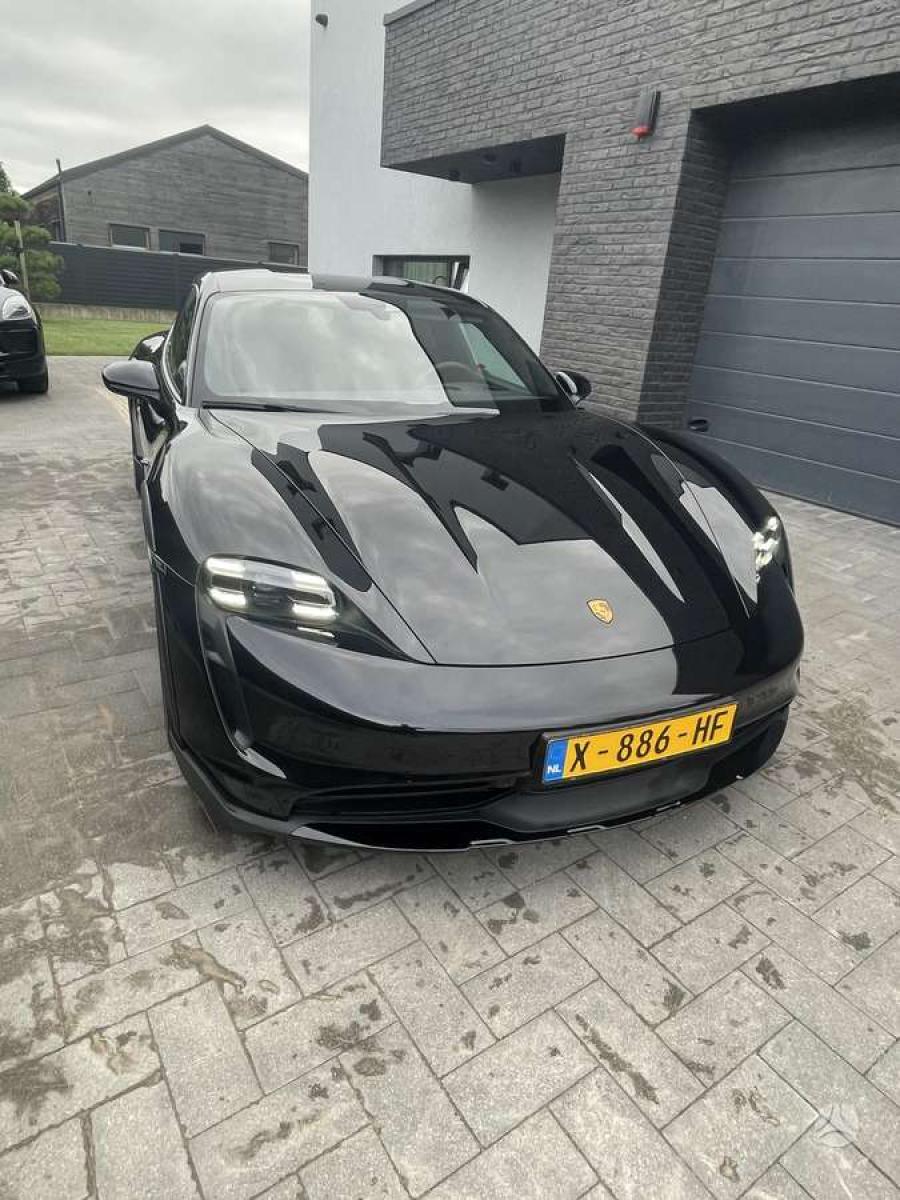 Black Porsche Taycan 2022 in Kaunas, with an engine capacity of 0.00 L and mileage of 66 thousand km for 56500 €, photo 6 on AUTOMOTO.COM.LV