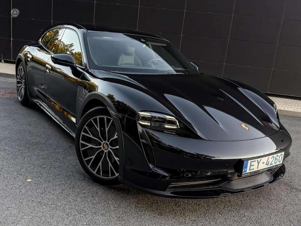 Black Porsche Taycan 2022 in Siauliai, with an engine capacity of 0.00 L and mileage of 74 thousand km for 67900 €, photo 1 on AUTOMOTO.COM.LV