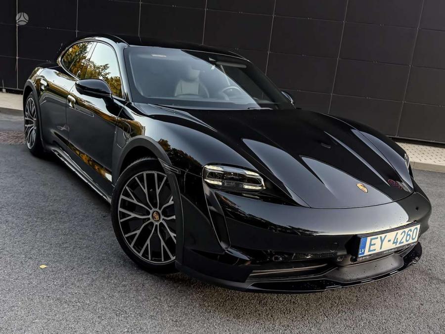 Black Porsche Taycan 2022 in Siauliai, with an engine capacity of 0.00 L and mileage of 74 thousand km for 67900 €, photo 1 on AUTOMOTO.COM.LV