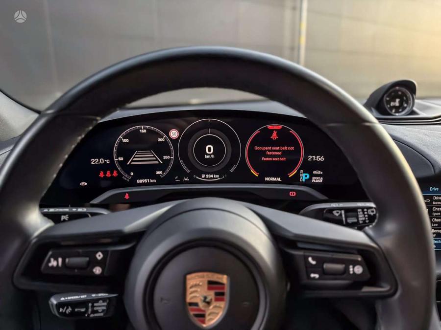 Black Porsche Taycan 2022 in Siauliai, with an engine capacity of 0.00 L and mileage of 74 thousand km for 67900 €, photo 26 on AUTOMOTO.COM.LV