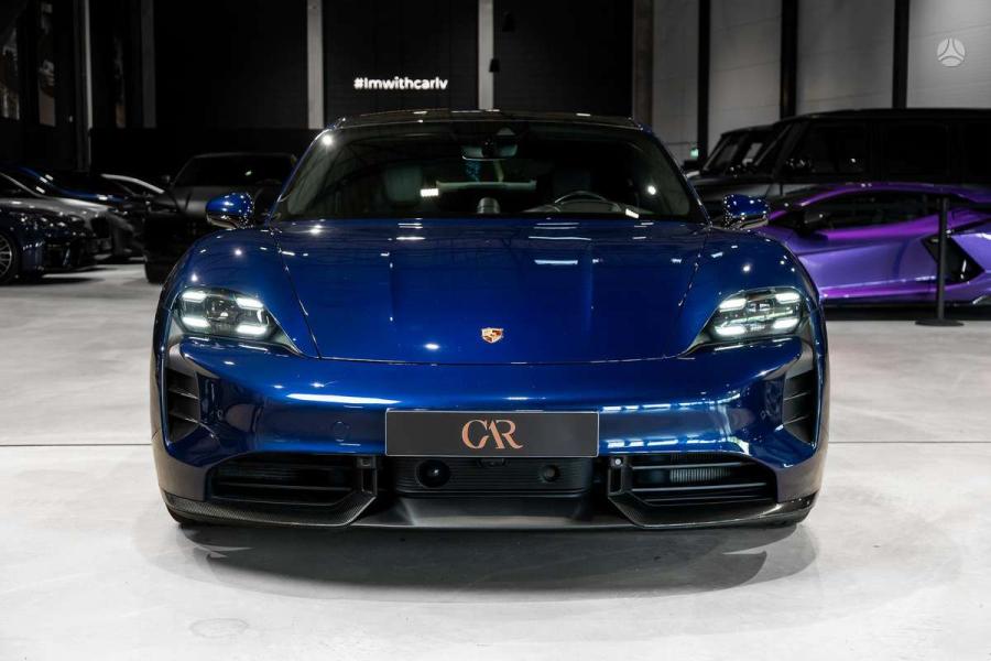 Blue Porsche Taycan 2021 in Riga, with an engine capacity of 0.00 L and mileage of 90 thousand km for 79900 €, photo 3 on AUTOMOTO.COM.LV