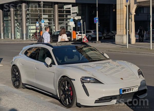 Pelēks Porsche Taycan 2022 Rīga, ar dzinēja tilpumu 0.00 L un nobraukumu 55 tūkst. km par 71500 €, foto 1 vietnē AUTOMOTO.COM.LV
