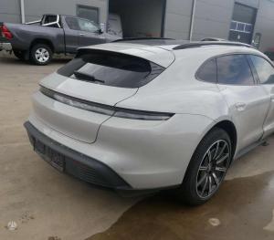 Grey Porsche Taycan 2023 in Panevezys, with an engine capacity of 0.00 L and mileage of 30 thousand km for 7500 €, photo  on AUTOMOTO.COM.LV