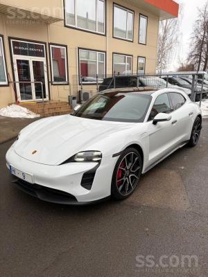 White Porsche Taycan 2023 in Riga, with an engine capacity of 0.00 L and mileage of 45 thousand km for 72900 €, photo  on AUTOMOTO.COM.LV