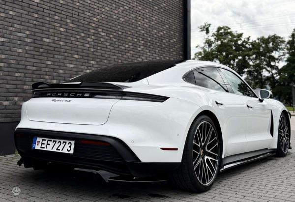 White Porsche Taycan 2020 in Kaunas, with an engine capacity of 0.00 L and mileage of 54 thousand km for 50000 €, photo 4 on AUTOMOTO.COM.LV