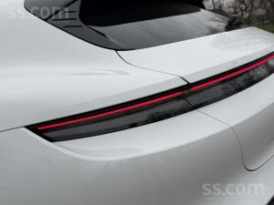 White Porsche Taycan 2021 in Riga, with an engine capacity of 0.00 L and mileage of 42 thousand km for 59900 €, photo 15 on AUTOMOTO.COM.LV