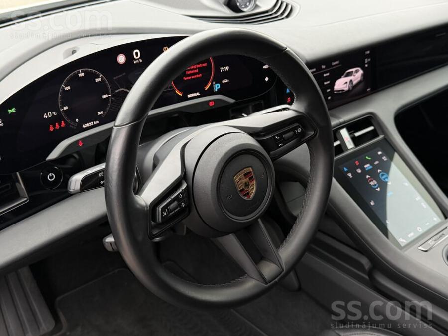 White Porsche Taycan 2021 in Riga, with an engine capacity of 0.00 L and mileage of 42 thousand km for 59900 €, photo 16 on AUTOMOTO.COM.LV
