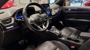 Black Renault Arkana 2023 in Riga, with an engine capacity of 1.60 L and mileage of 84 thousand km for 19490 €, photo 9 on AUTOMOTO.COM.LV