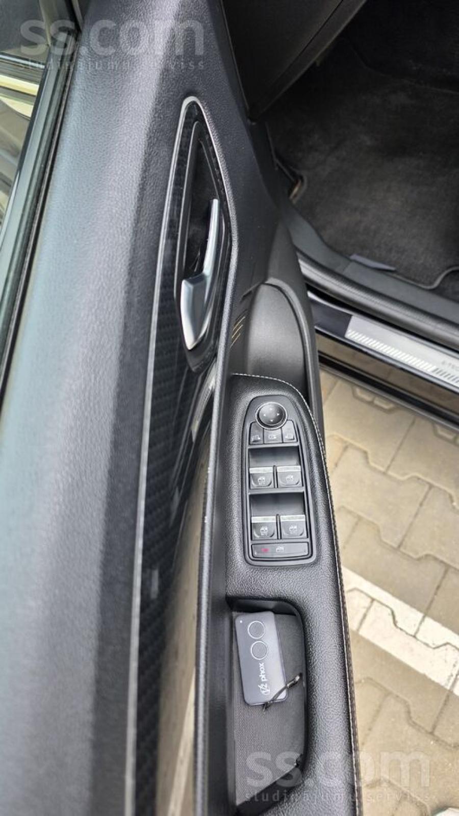 Black Renault Arkana 2023 in Riga, with an engine capacity of 1.60 L and mileage of 82 thousand km for 21950 €, photo 5 on AUTOMOTO.COM.LV