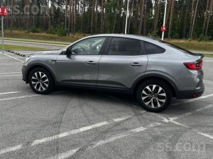 Grey Renault Arkana 2022 in Riga, with an engine capacity of 1.30 L and mileage of 62 thousand km for 16000 €, photo 12 on AUTOMOTO.COM.LV