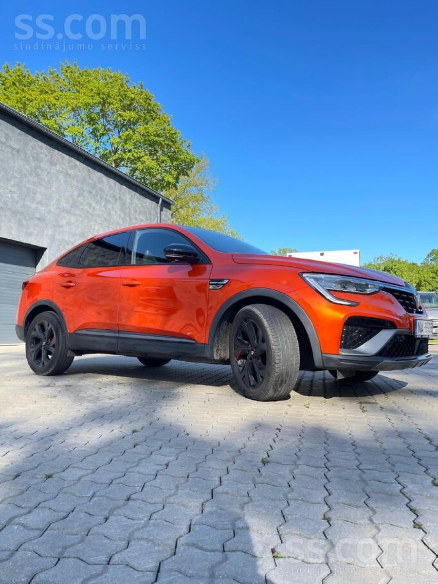 Orange Renault Arkana 2021 in Riga, with an engine capacity of 1.30 L and mileage of 77 thousand km for 15400 €, photo 1 on AUTOMOTO.COM.LV