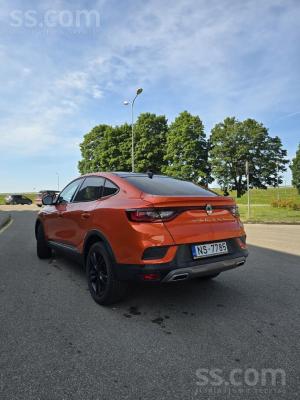 Orange Renault Arkana 2021 in Daugavpils, with an engine capacity of 1.30 L and mileage of 19 thousand km for 19000 €, photo 8 on AUTOMOTO.COM.LV