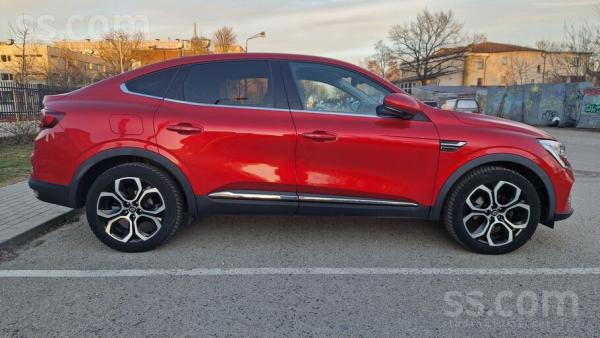 Red Renault Arkana 2021 in Riga, with an engine capacity of 1.30 L and mileage of 63 thousand km for 15500 €, photo 5 on AUTOMOTO.COM.LV